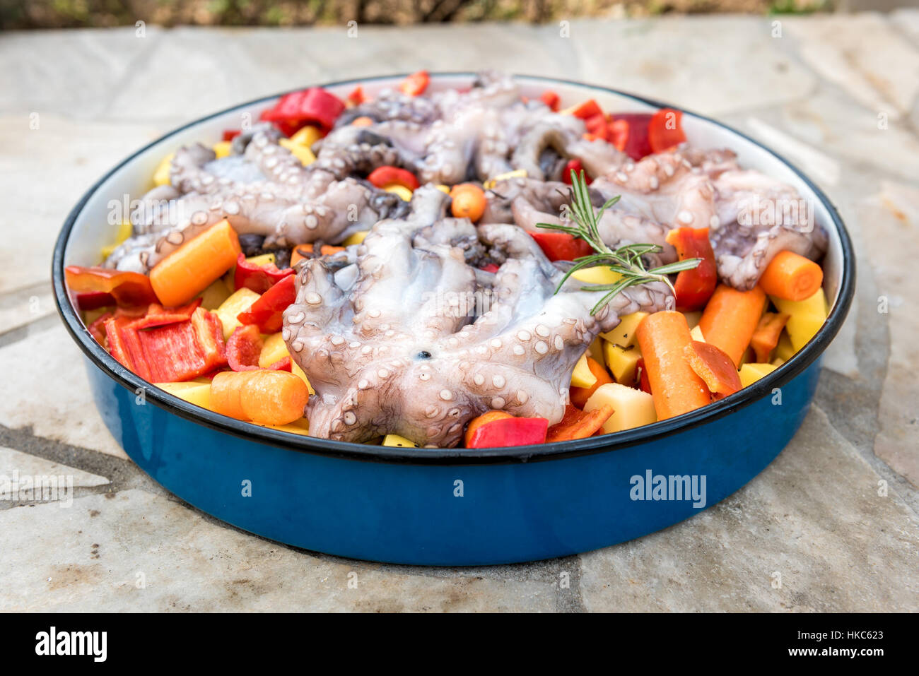Preparing and Cooking of octopus in traditional Balkan Greek ...