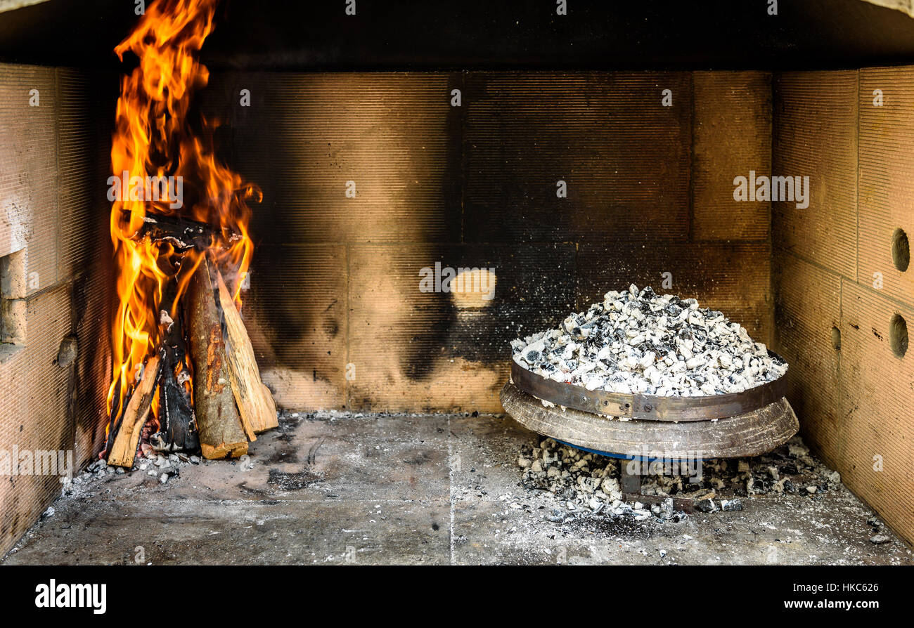 Cooking of traditional Balkan Greek Mediterranean Croatian meal Peka in ...