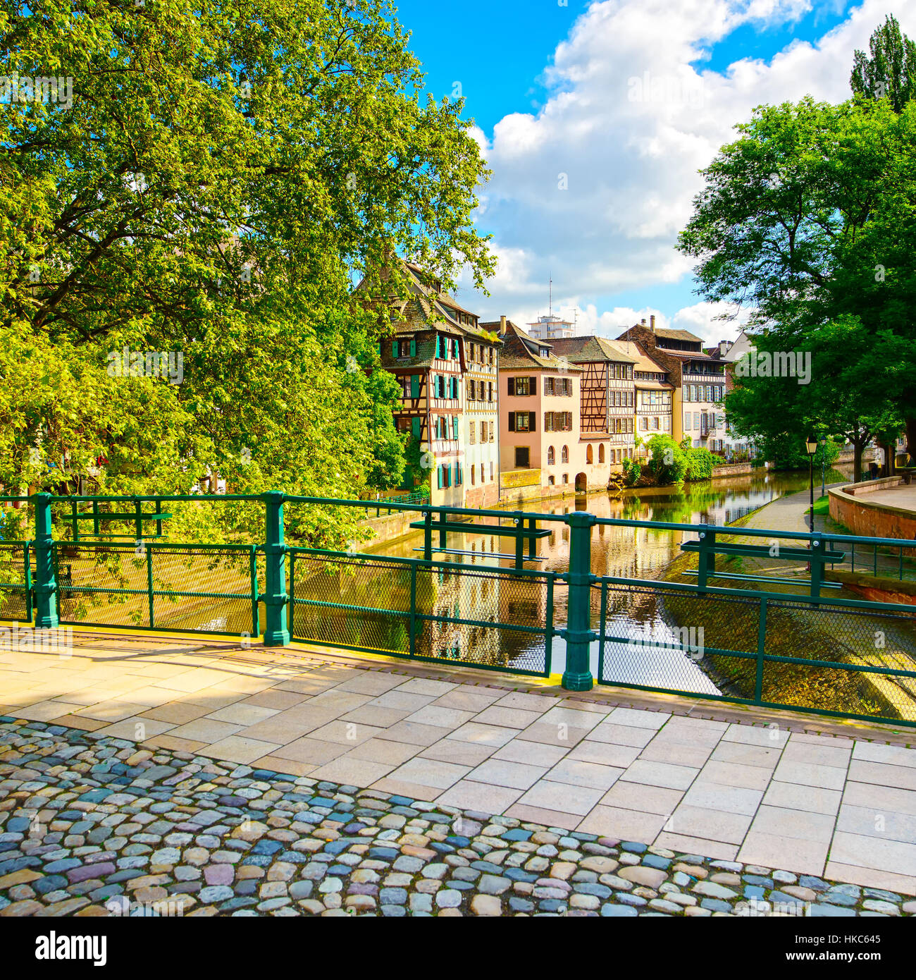 Strasbourg, water canal and bridge in Petite France area. Half timbered ...