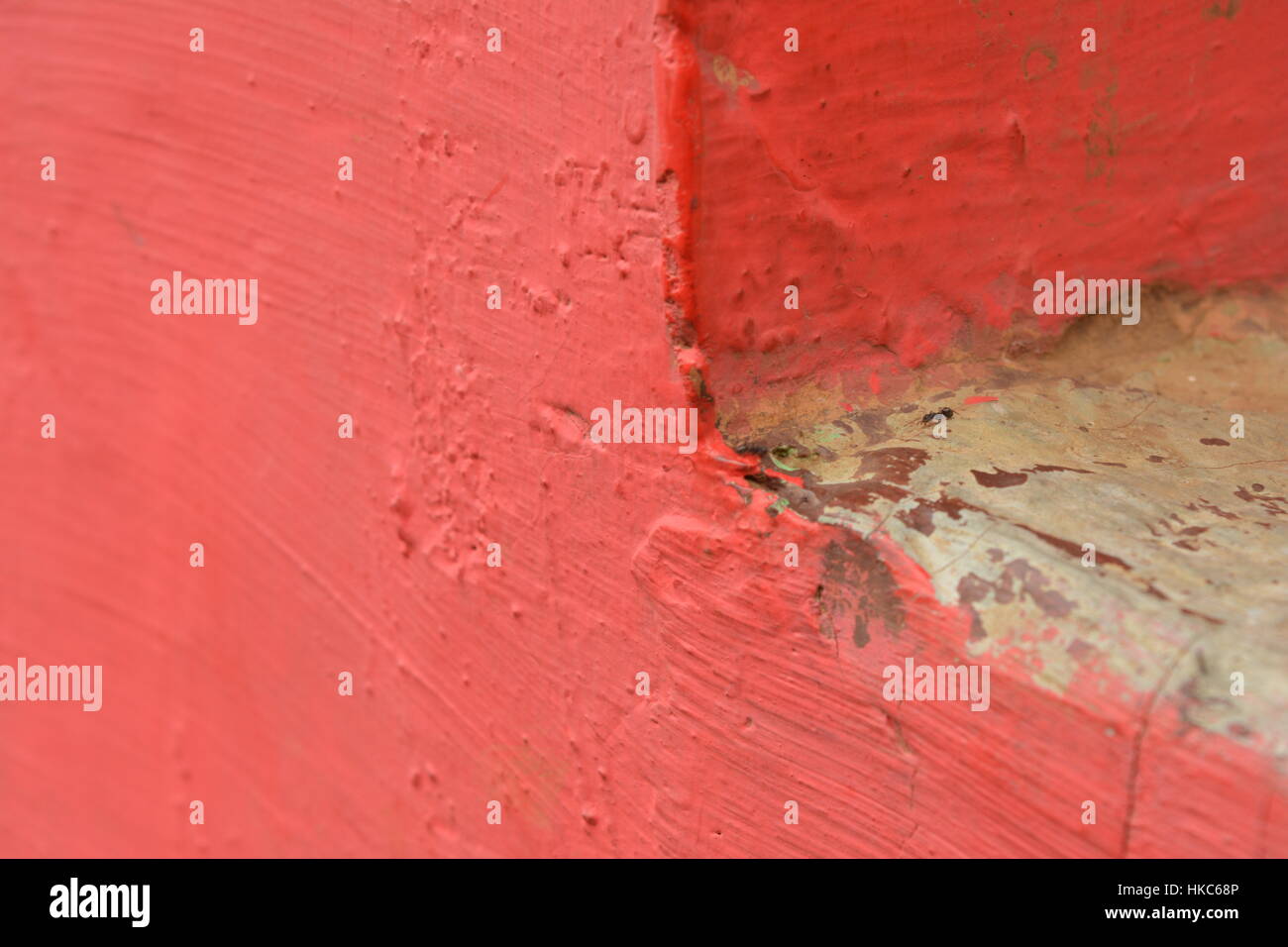 Texture on red wally Stock Photo - Alamy