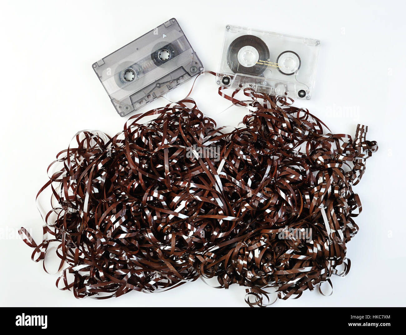 tape casettes on white background with curved tape Stock Photo - Alamy