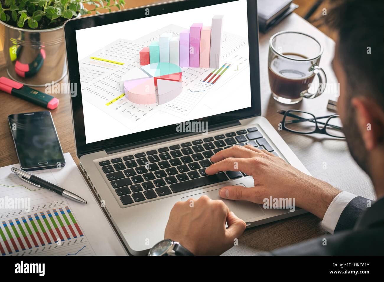 Data analysis reports on a computer's screen Stock Photo - Alamy