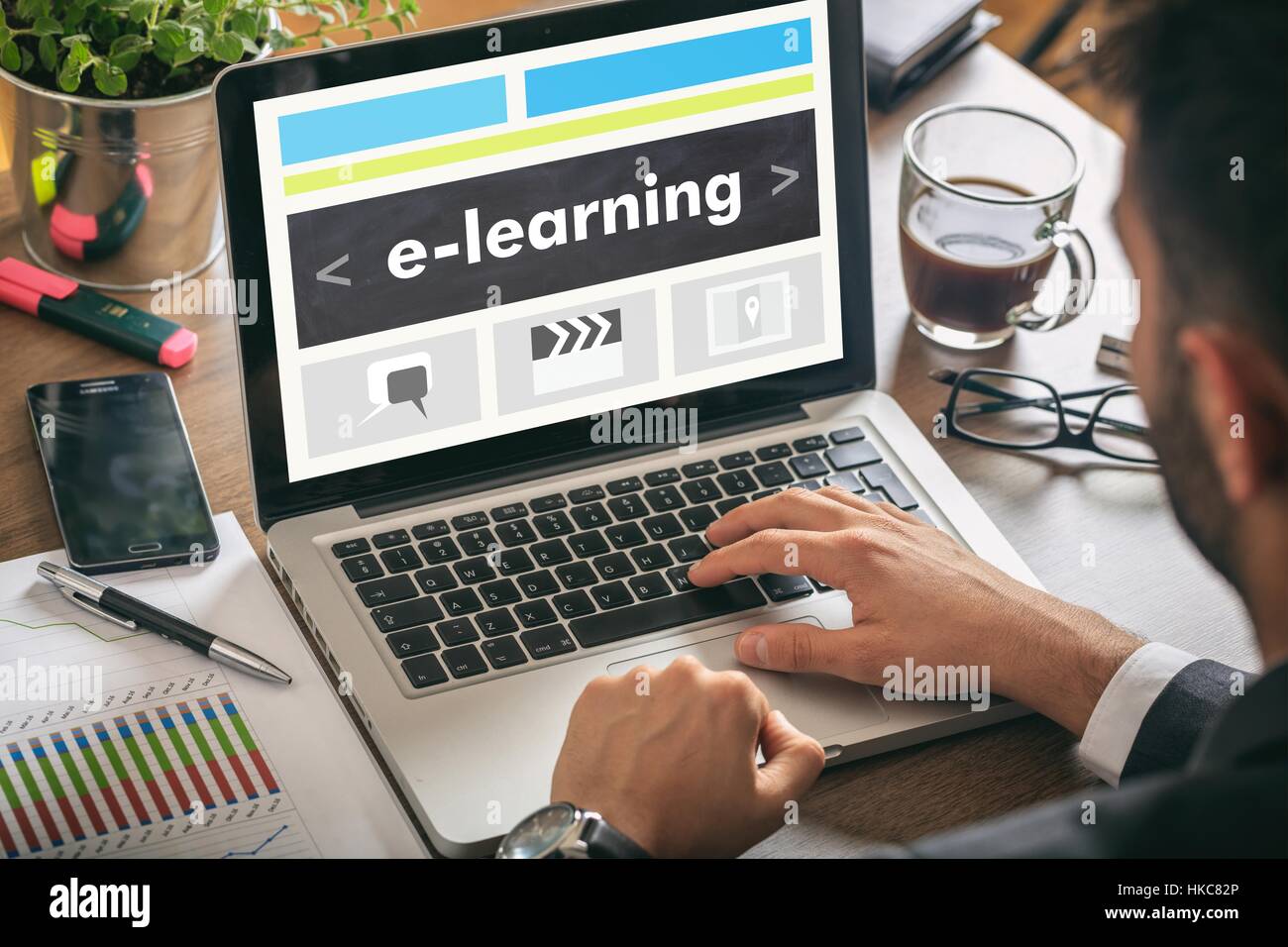 Man studying on a laptop Stock Photo - Alamy