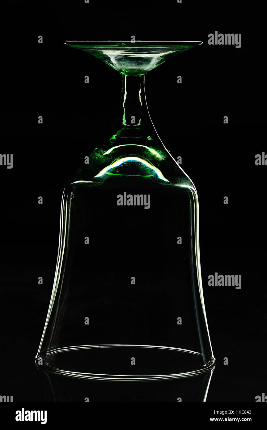 silhouette of glass on a black background upside down Stock Photo - Alamy