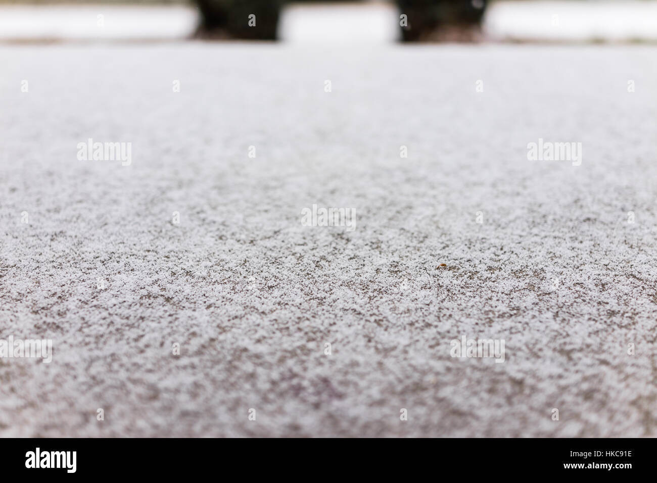 Thin layer of snow on stone stairs Stock Photo - Alamy