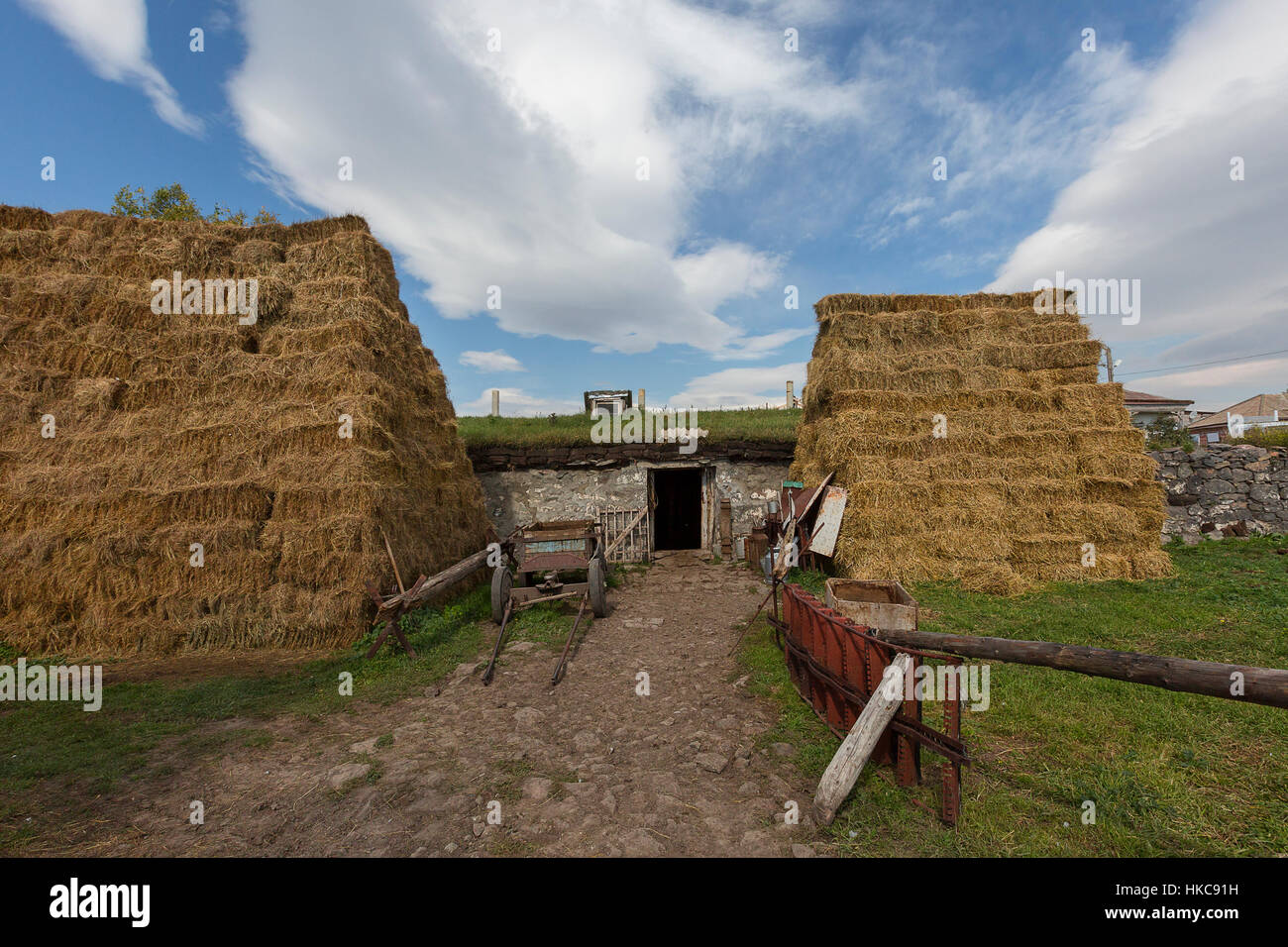 Farm scene and stacks of hay in Georgia Stock Photo - Alamy