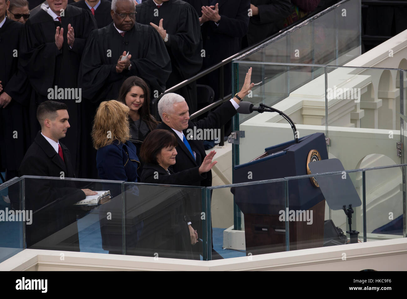 U.S. Vice President Mike Pence and his family wave to the crowd during ...