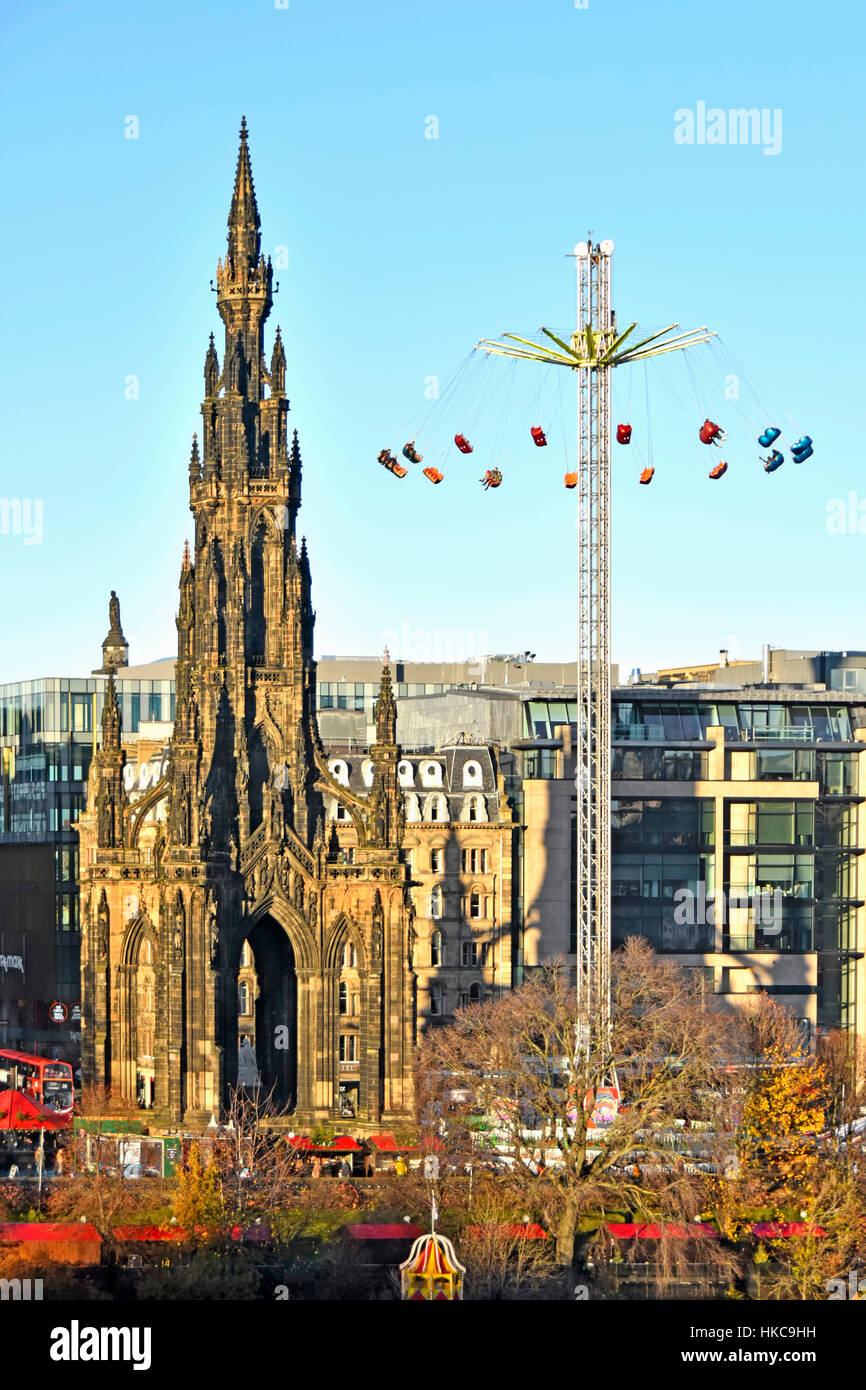 Historical Scott Monument & winter city centre fairground ride Autumn ...