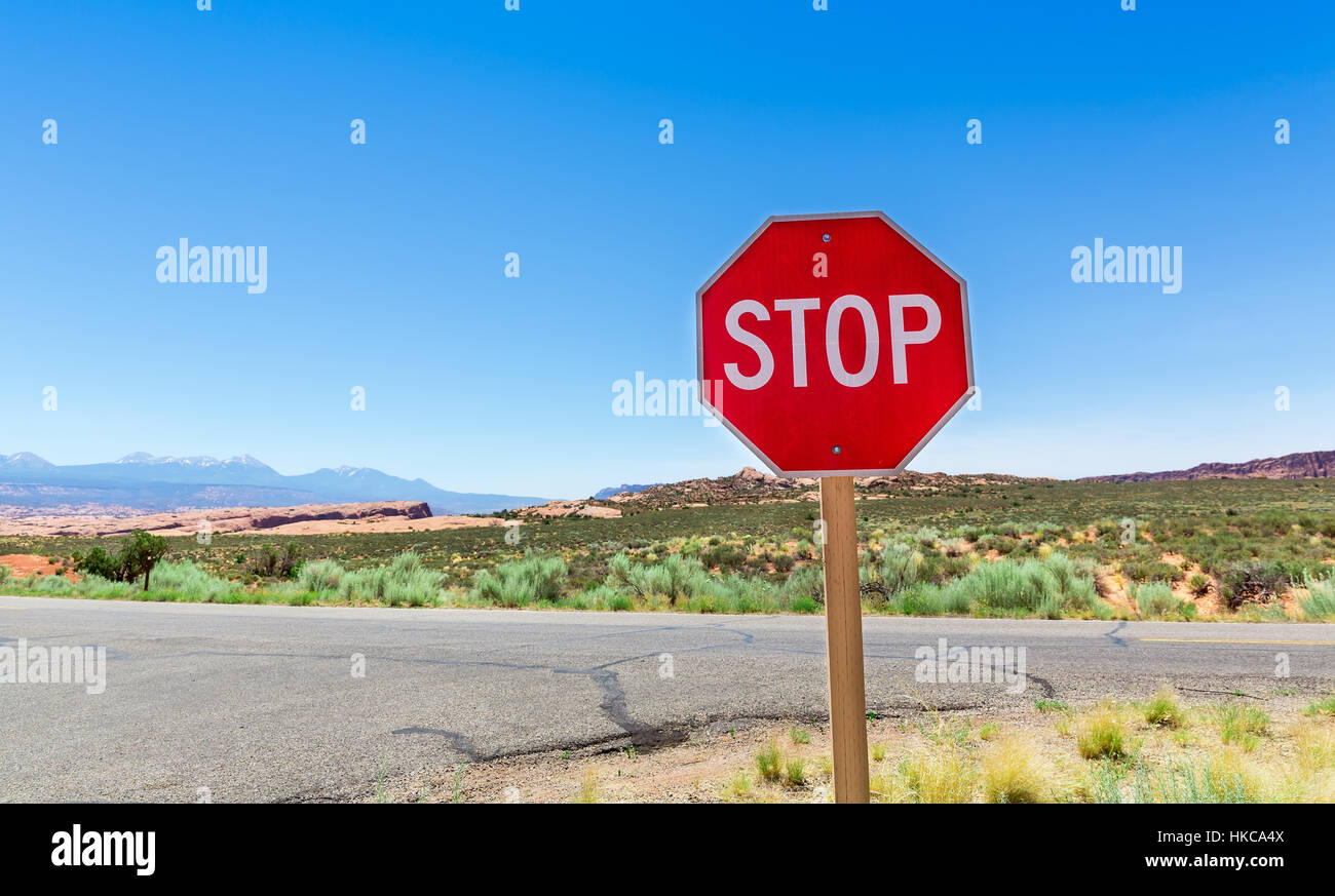 Stop sign on valley road Stock Photo - Alamy
