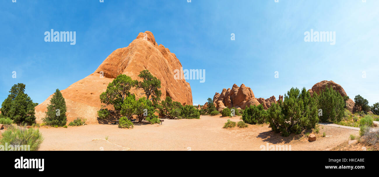 Stone mountains in valley Stock Photo - Alamy