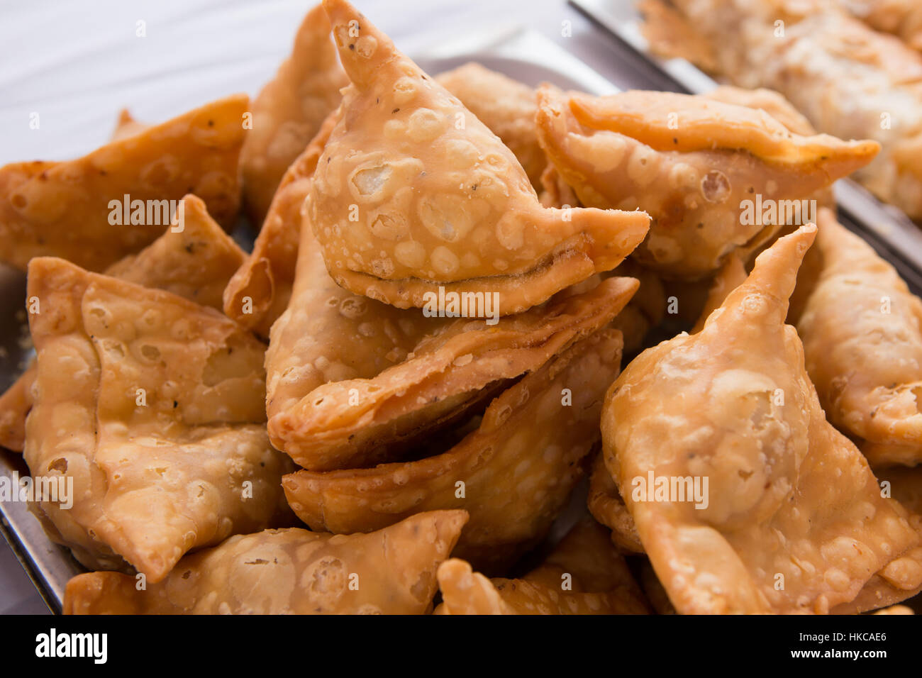 Indian street food snack Samosa Stock Photo - Alamy