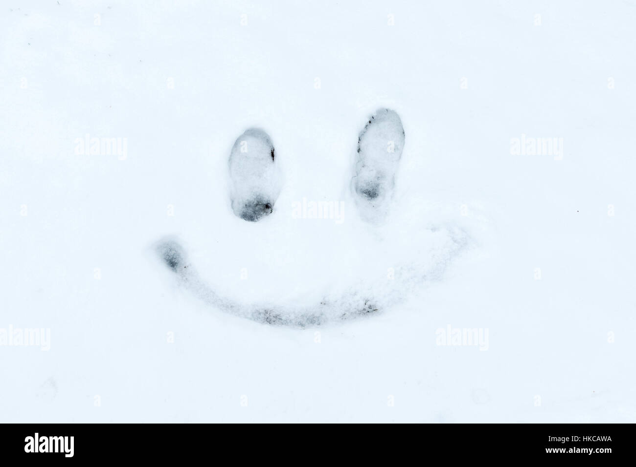 Smiley made in snow hi-res stock photography and images - Alamy