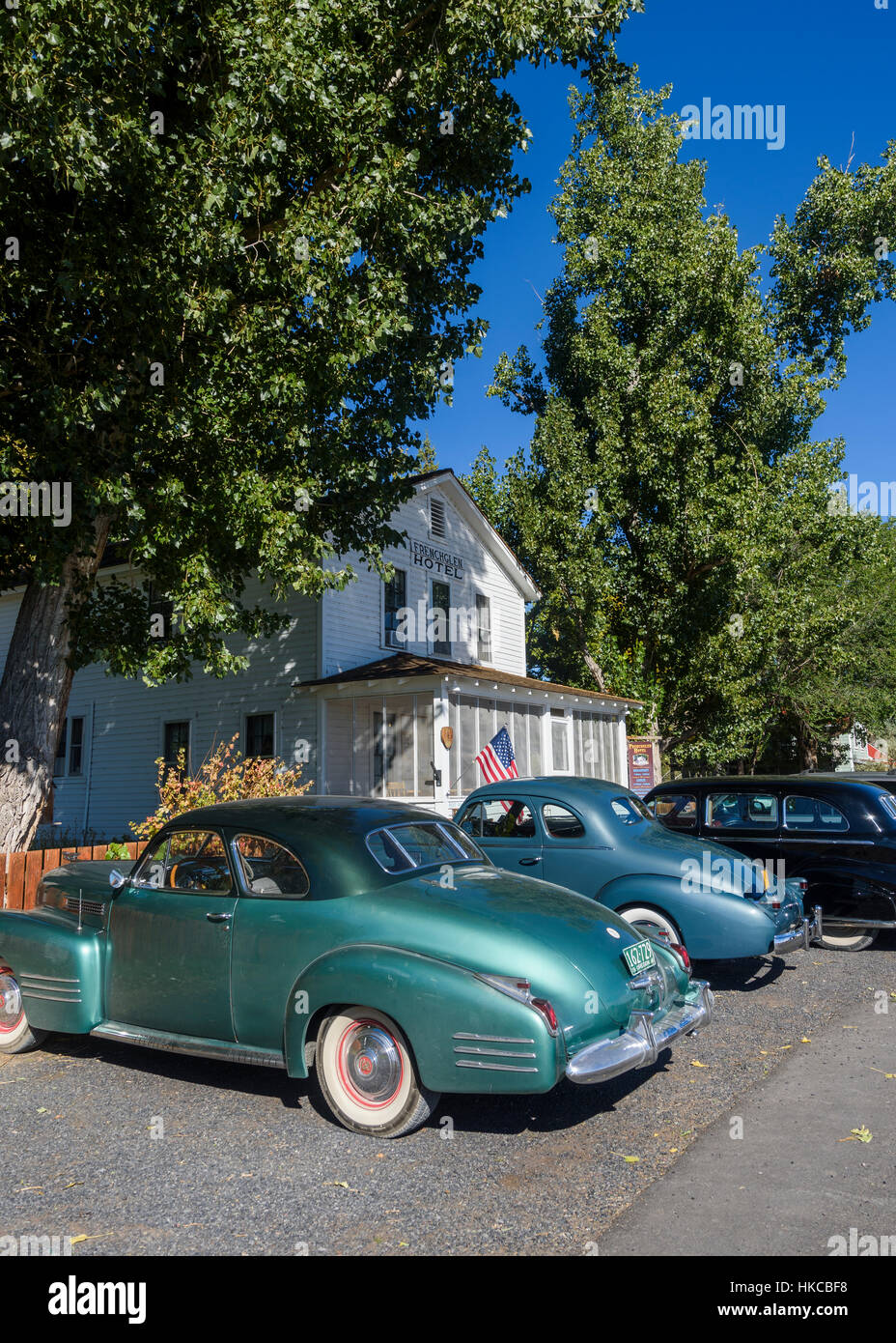 Classic cars park in front of the Frenchglen Hotel; Frenchglen, Oregon ...
