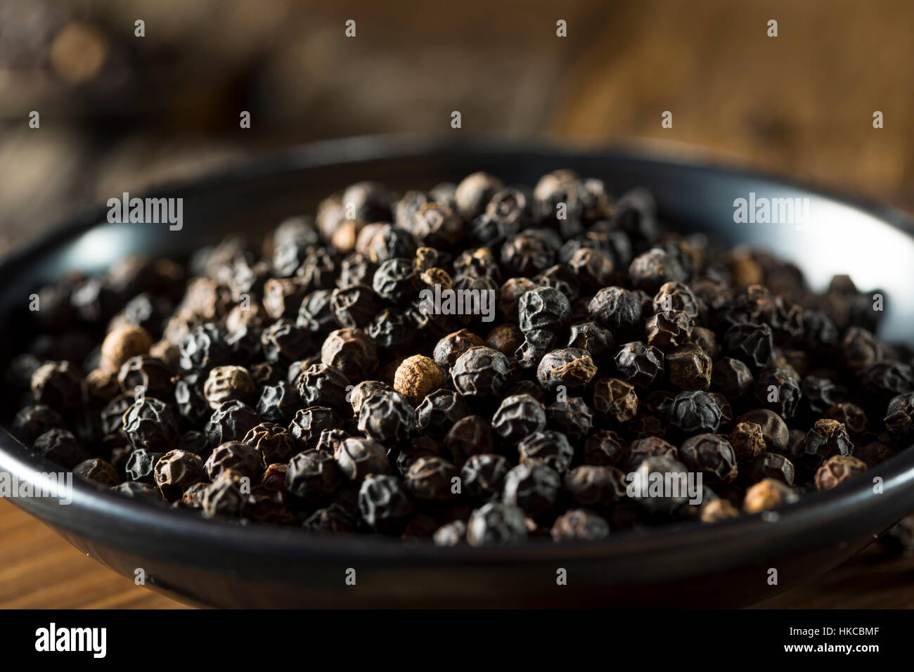 Raw Organic Black Peppercorns Ready to Use Stock Photo - Alamy