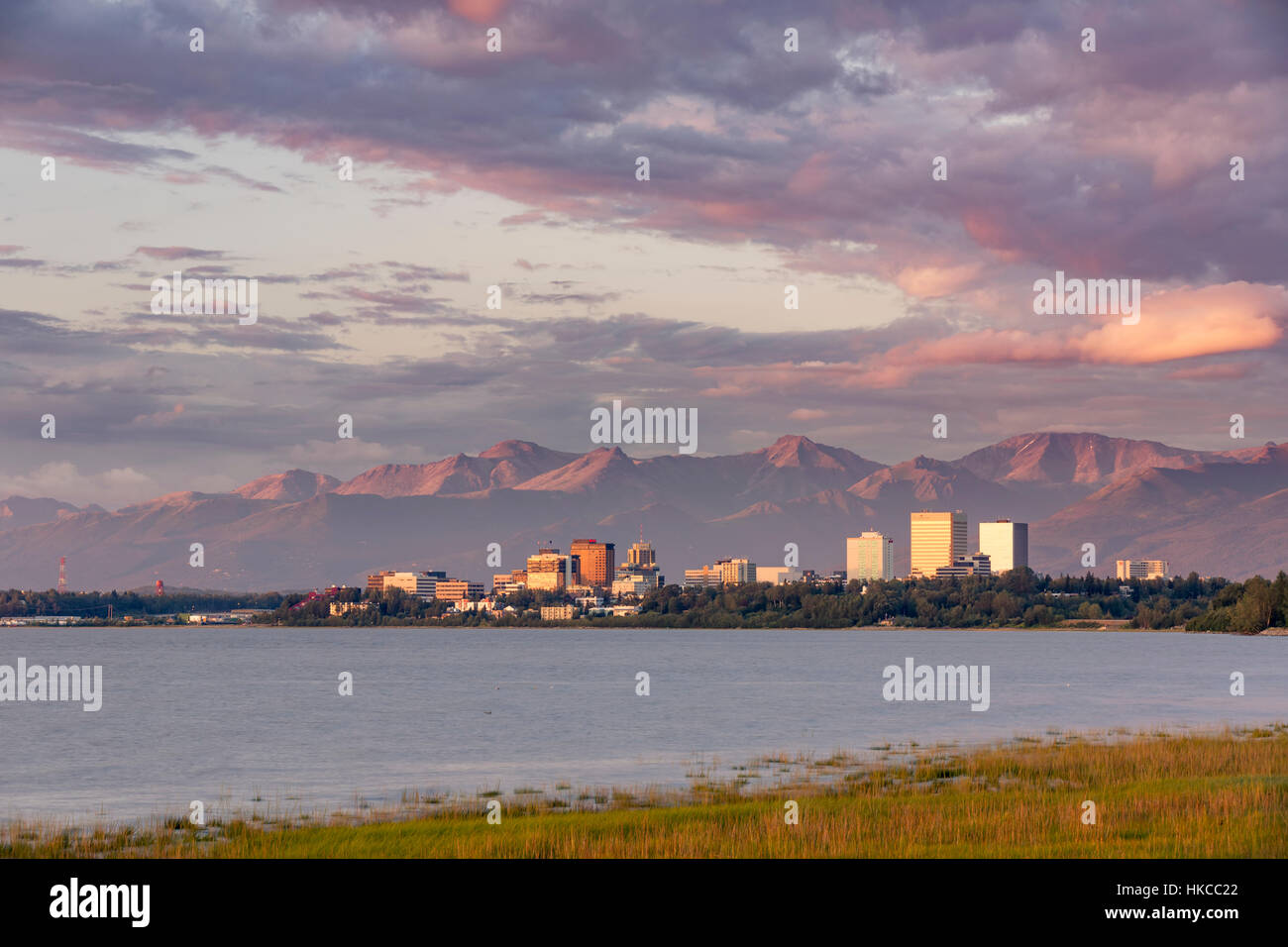 View of downtown Anchorage during an atmospheric sunset as seen from ...