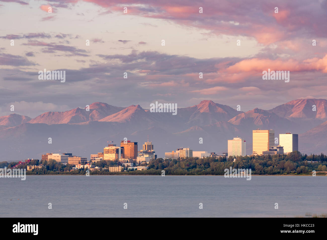 View of downtown Anchorage during an atmospheric sunset as seen from ...