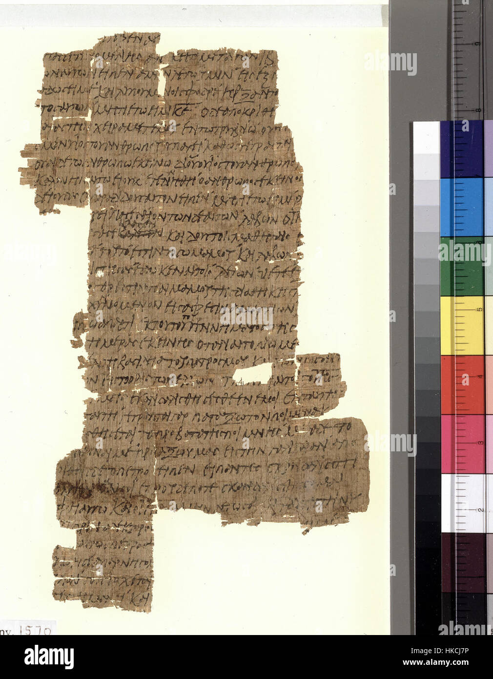 An ancient papyrus fragment, identified as Papyrus 37 recto, showcasing ...