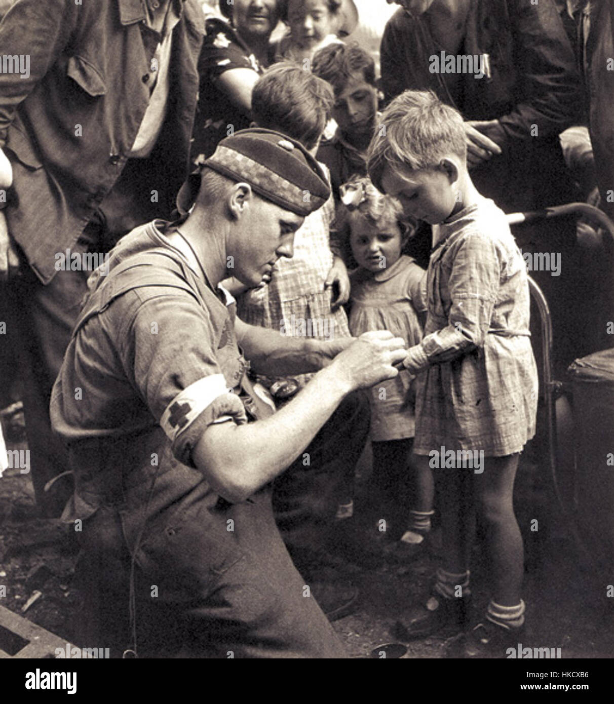 'Canadian Private MacDonald Gives First Aid' captures a poignant moment ...