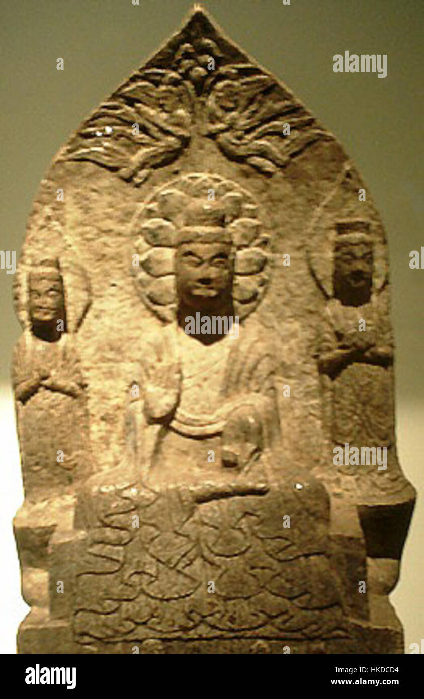 A traditional artwork featuring a depiction of Buddha, symbolizing ...