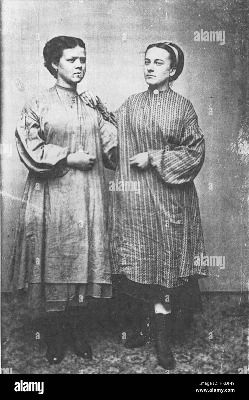 Women work on painting Black and White Stock Photos & Images - Alamy