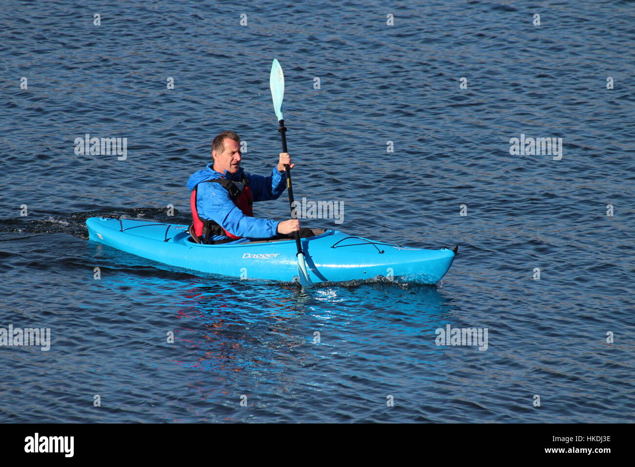 A kayaker in a blue Dagger Zydeco kayak, enjoying the waters of the ...