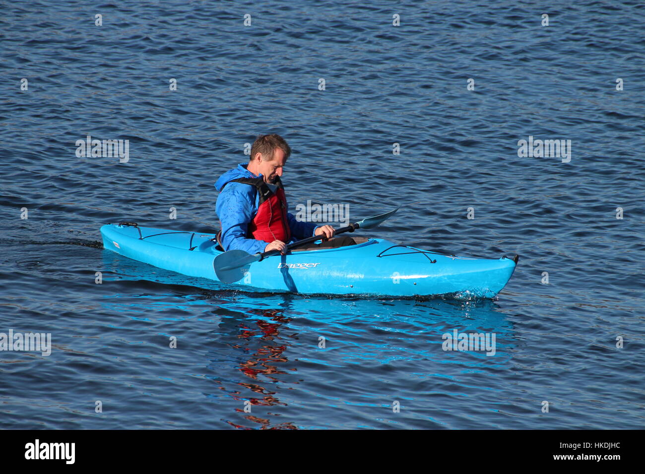 A kayaker in a blue Dagger Zydeco kayak, enjoying the waters of the ...