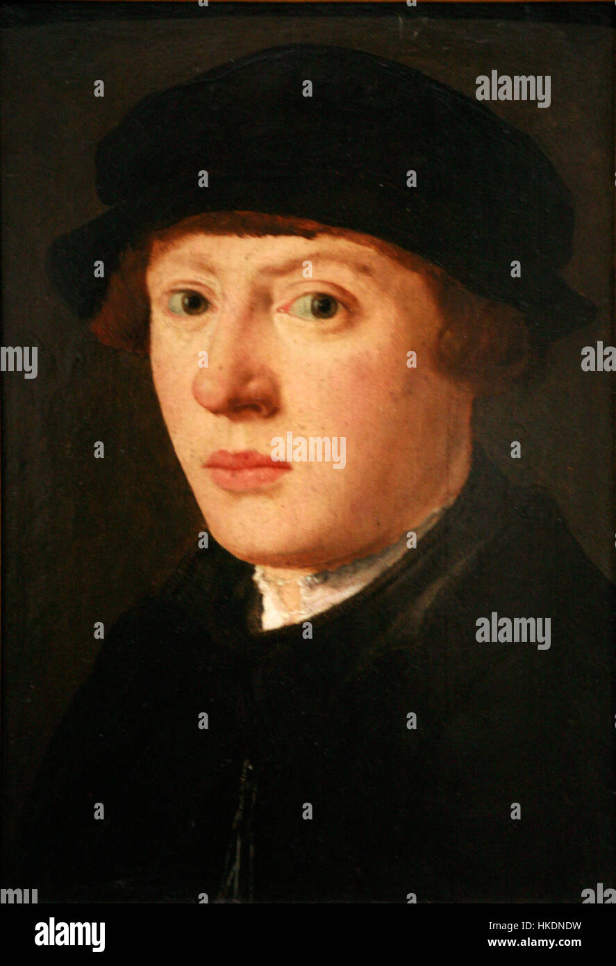 This historical portrait, titled 'Portrait of a Man,' is an oil ...