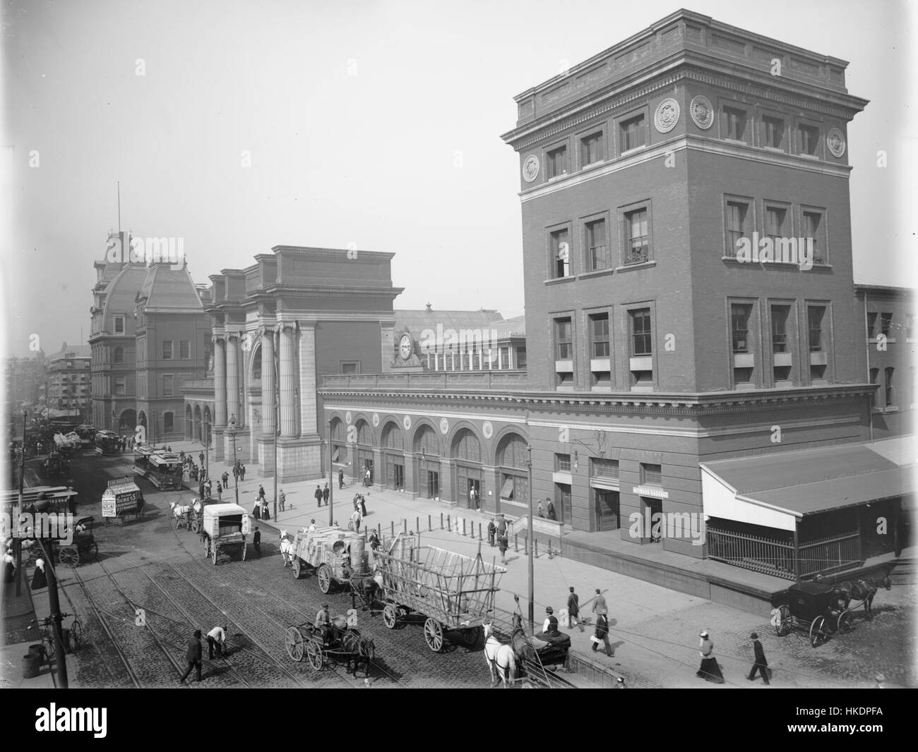 A 1890s painting of North Station in Boston, depicting the ...