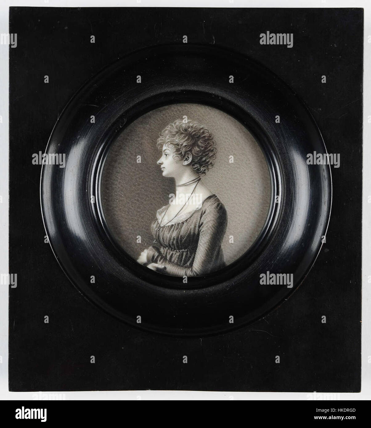 This portrait by Karpff depicts a woman in a refined and elegant manner ...