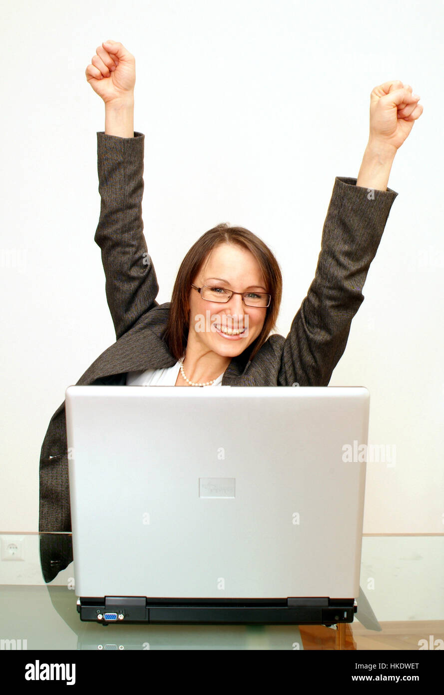 Business woman cheering Stock Photo - Alamy