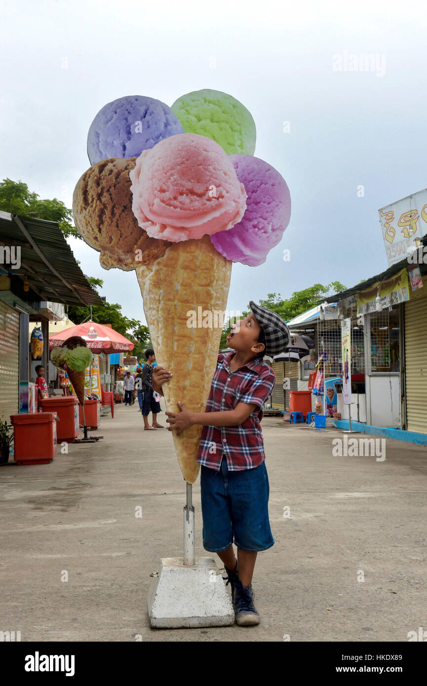 Boy with oversized cardboard ice cream cone, Phnom Penh Province, Cambodia Stock Photo - Alamy