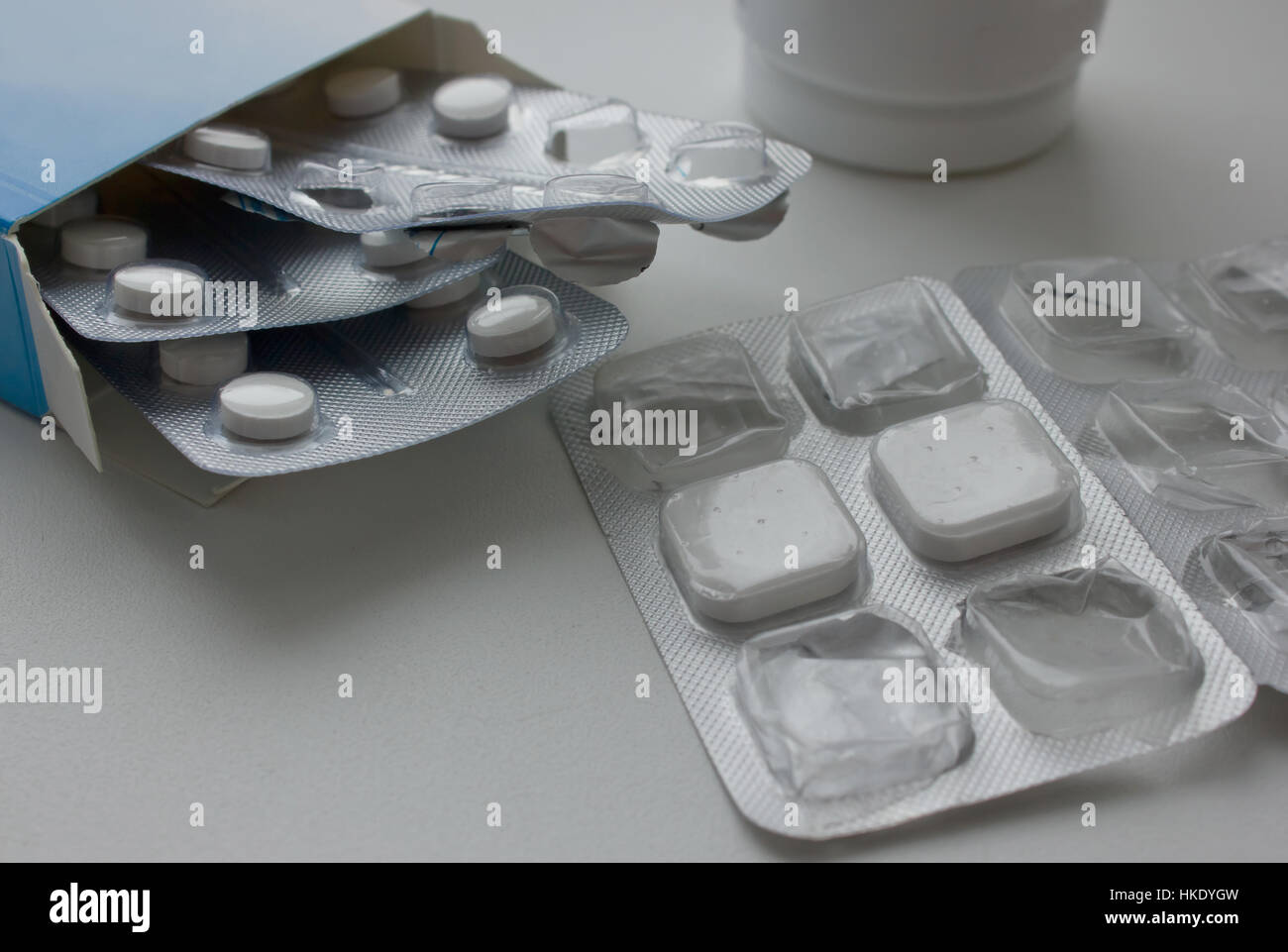 Packs of round and square tablets Stock Photo - Alamy