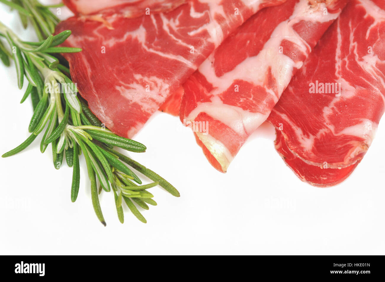 Italian lonza on white background Stock Photo - Alamy
