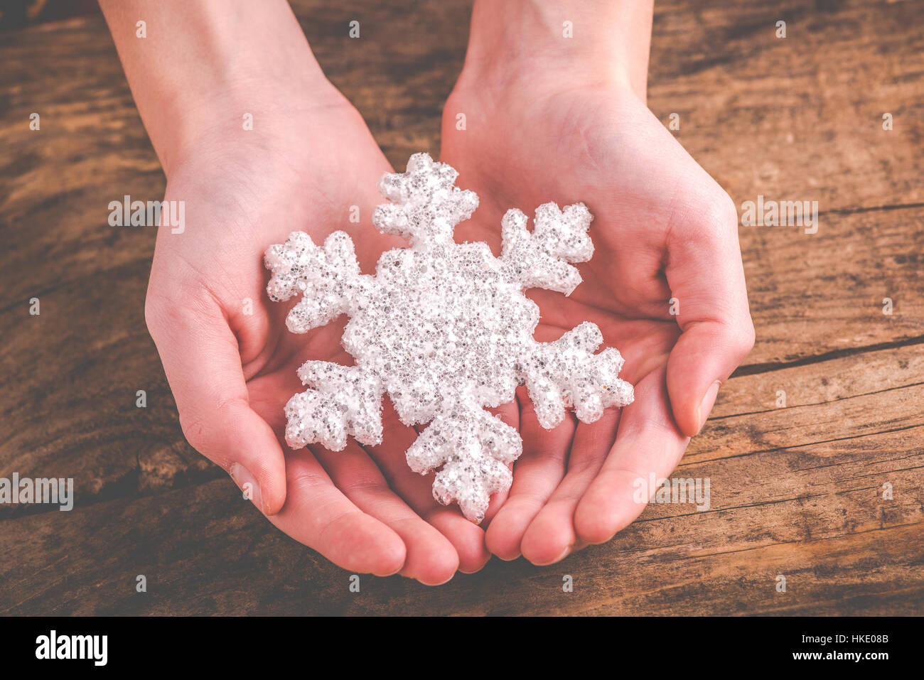 snowflake in the hands - winter time Stock Photo - Alamy