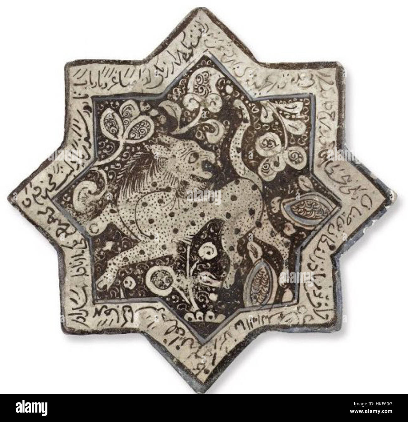 A Kashan lustre-decorated star tile from Central Persia, circa 1300 ...
