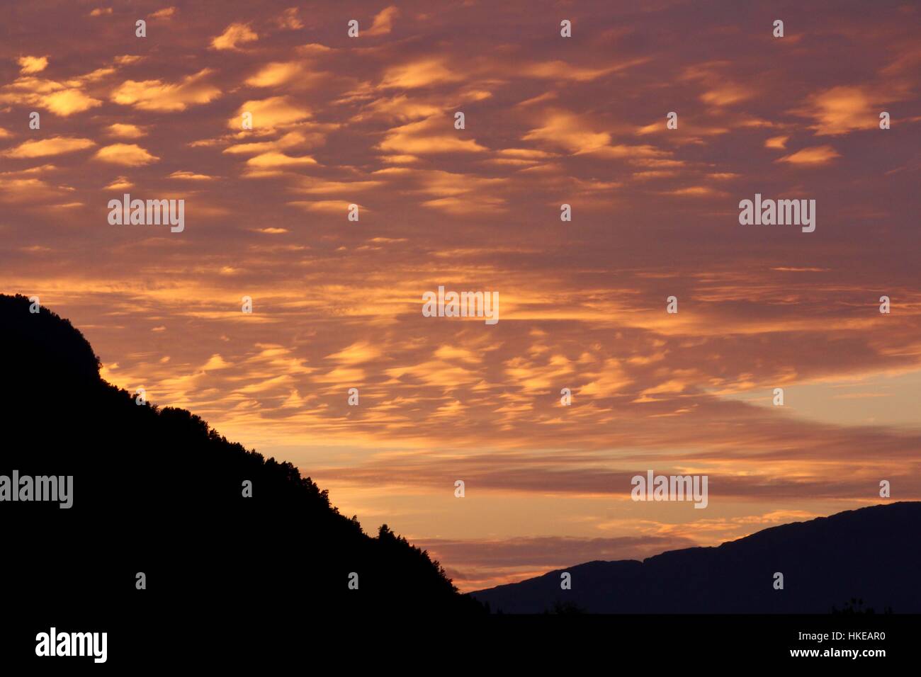 Sunset at the fjord in Sandane Stock Photo - Alamy