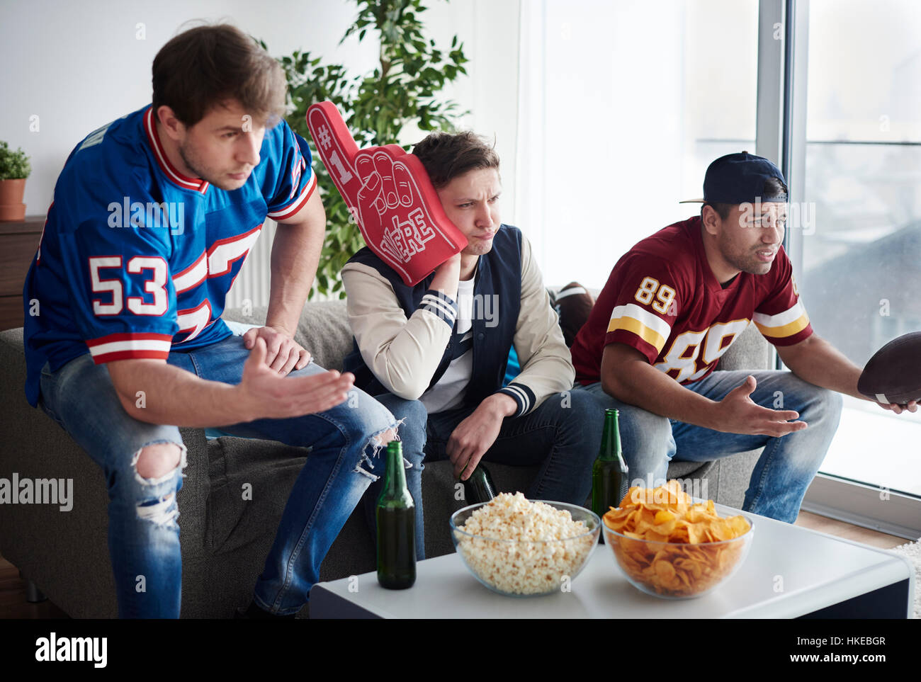 Group of friends together supporting football team Stock Photo - Alamy
