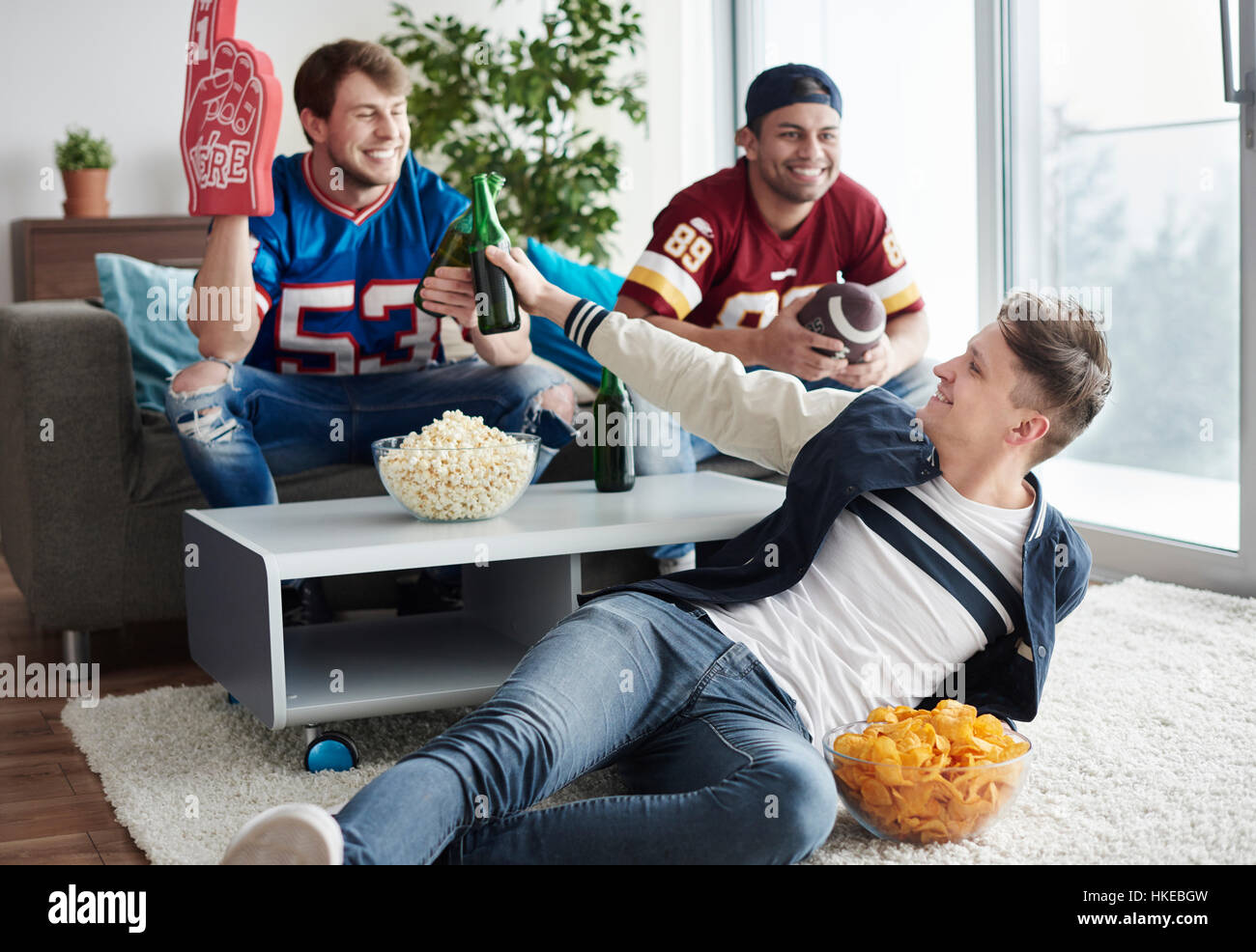 Happy guys hi-res stock photography and images - Alamy