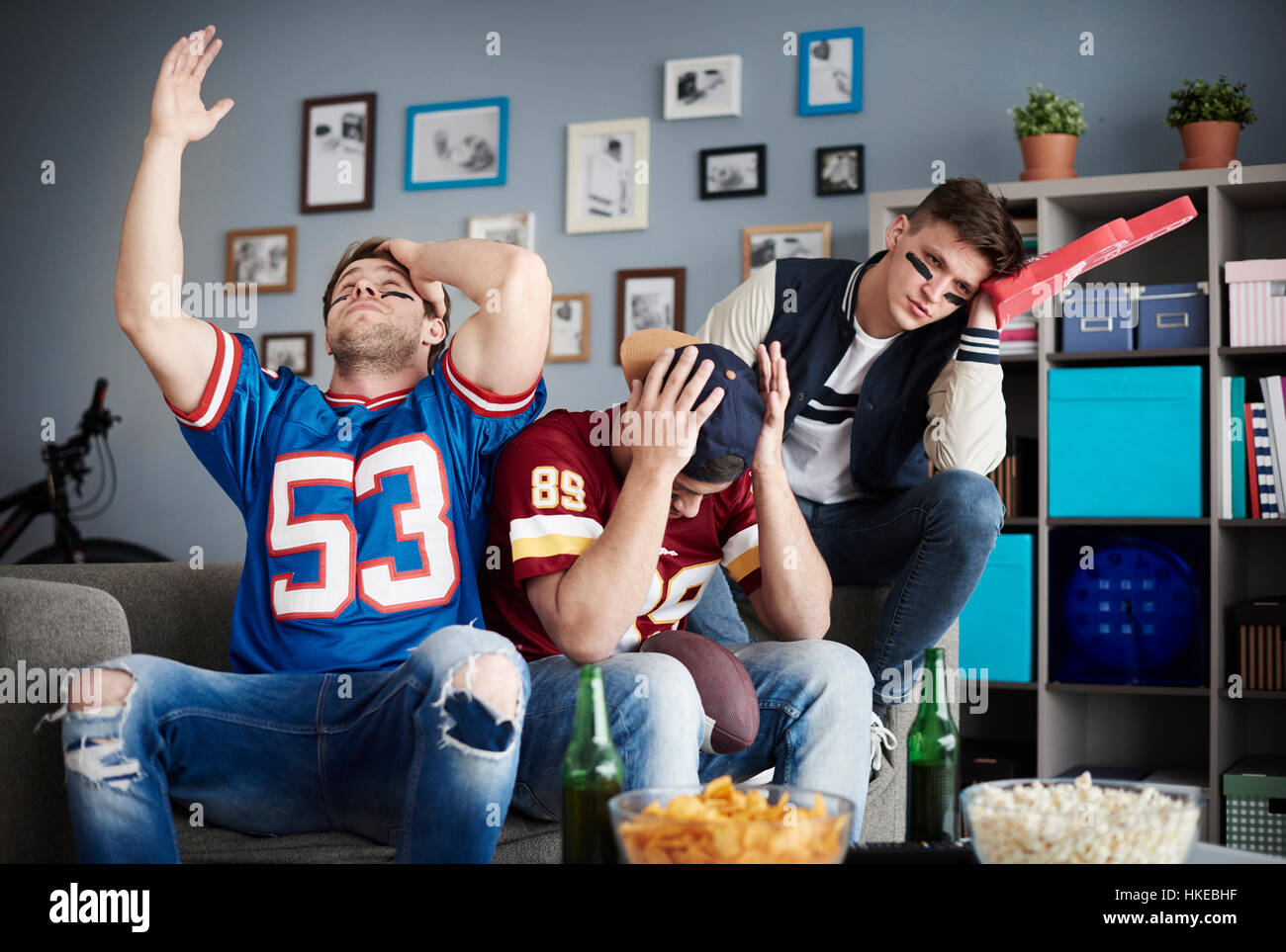 Football fans watching game hi-res stock photography and images - Alamy