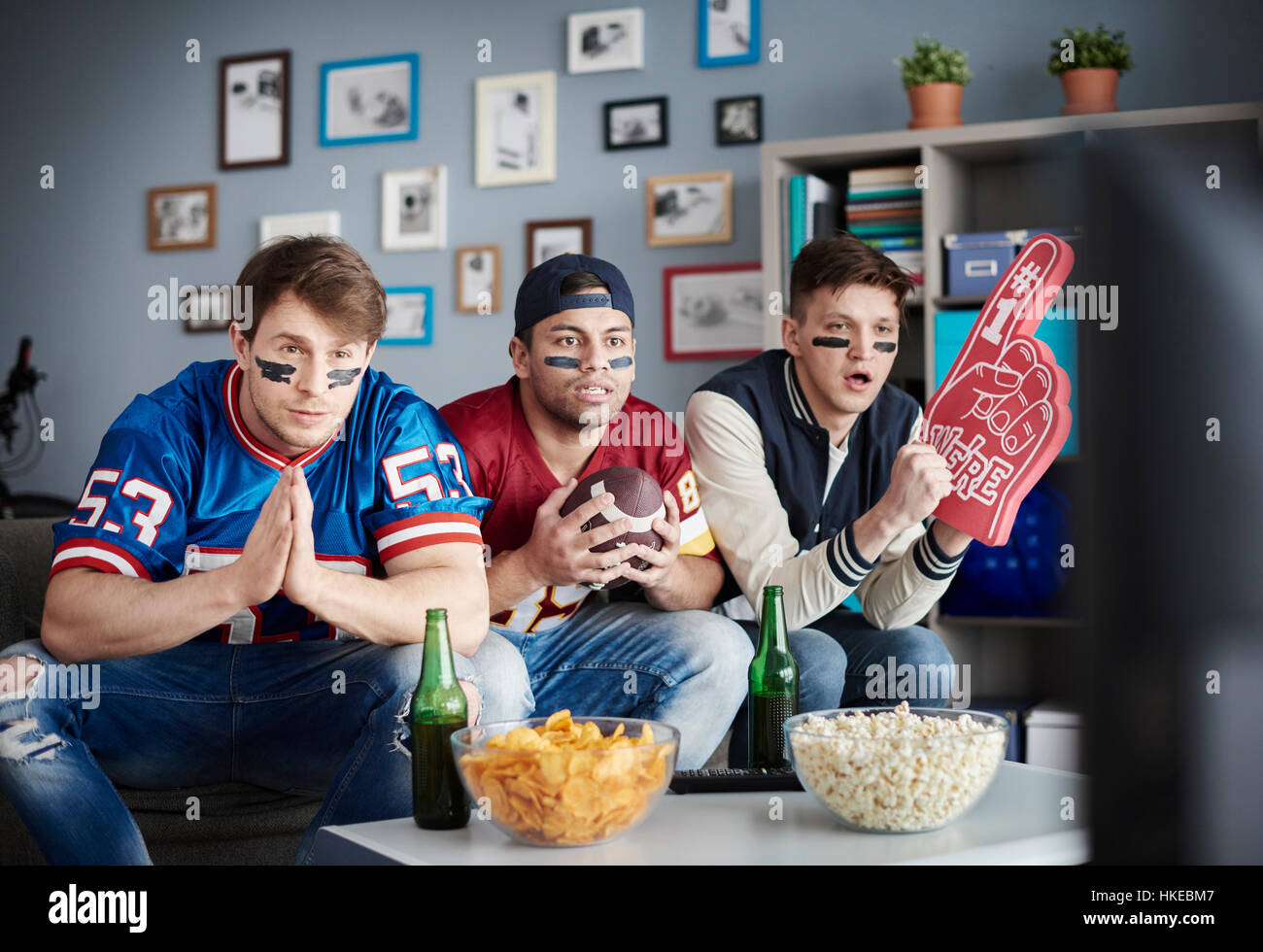 Guys full of high hope for the finally results Stock Photo - Alamy