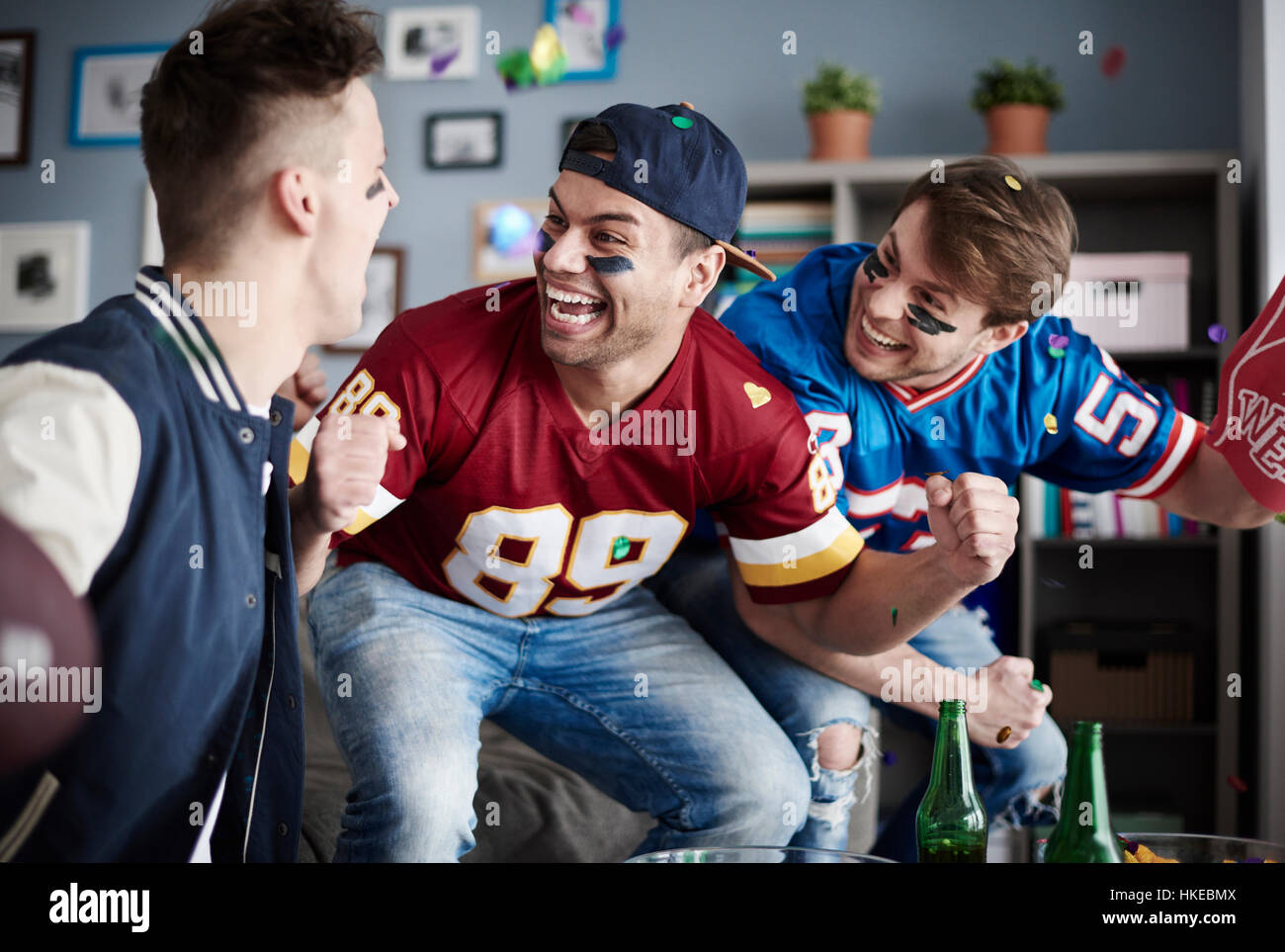 Men feeling such a joy after scoring Stock Photo - Alamy