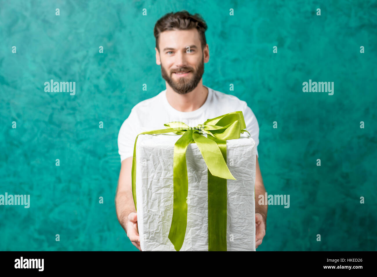 Man with a gift box Stock Photo - Alamy
