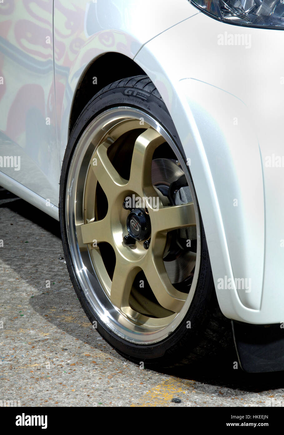 Modified Toyota IQ sub compact city car and graffiti wall Stock Photo ...