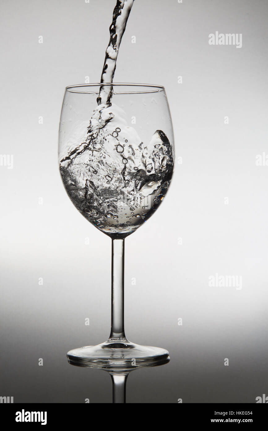 falling water in a glass Stock Photo - Alamy