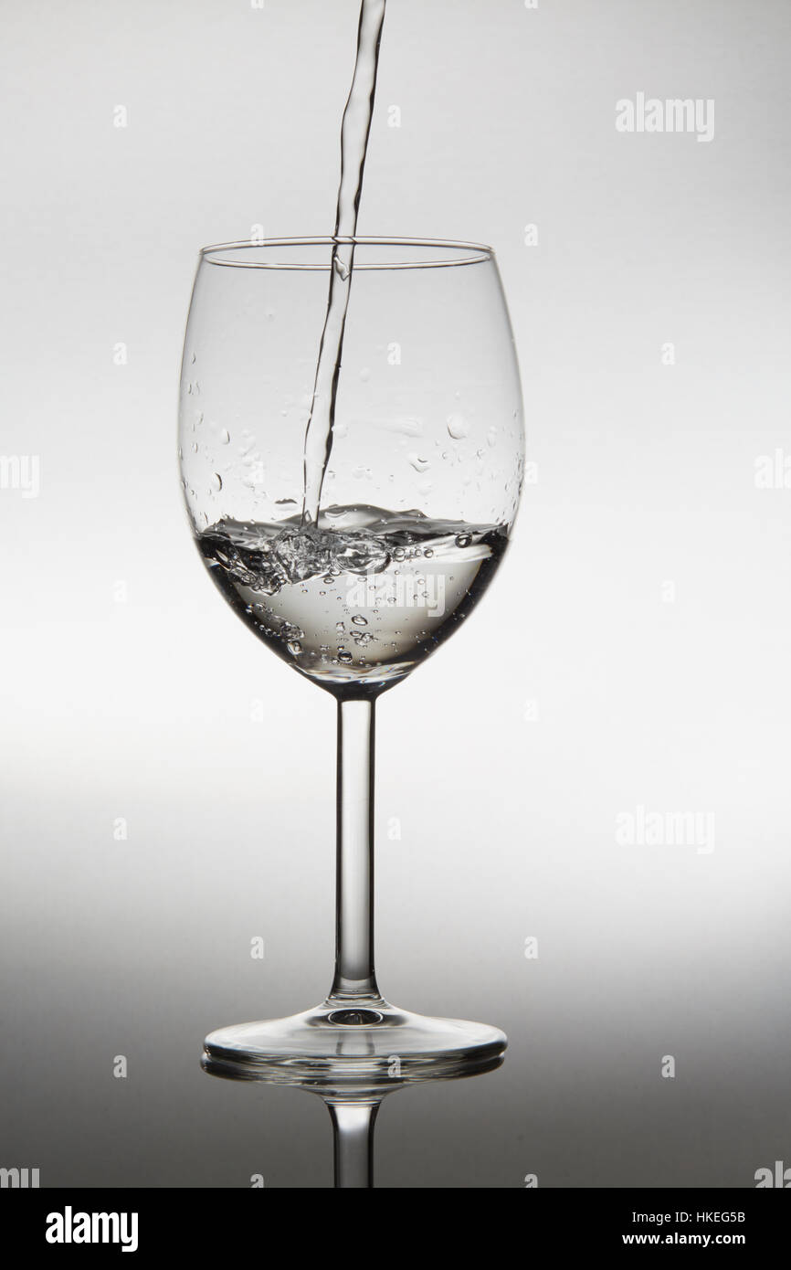 falling water in a glass Stock Photo - Alamy