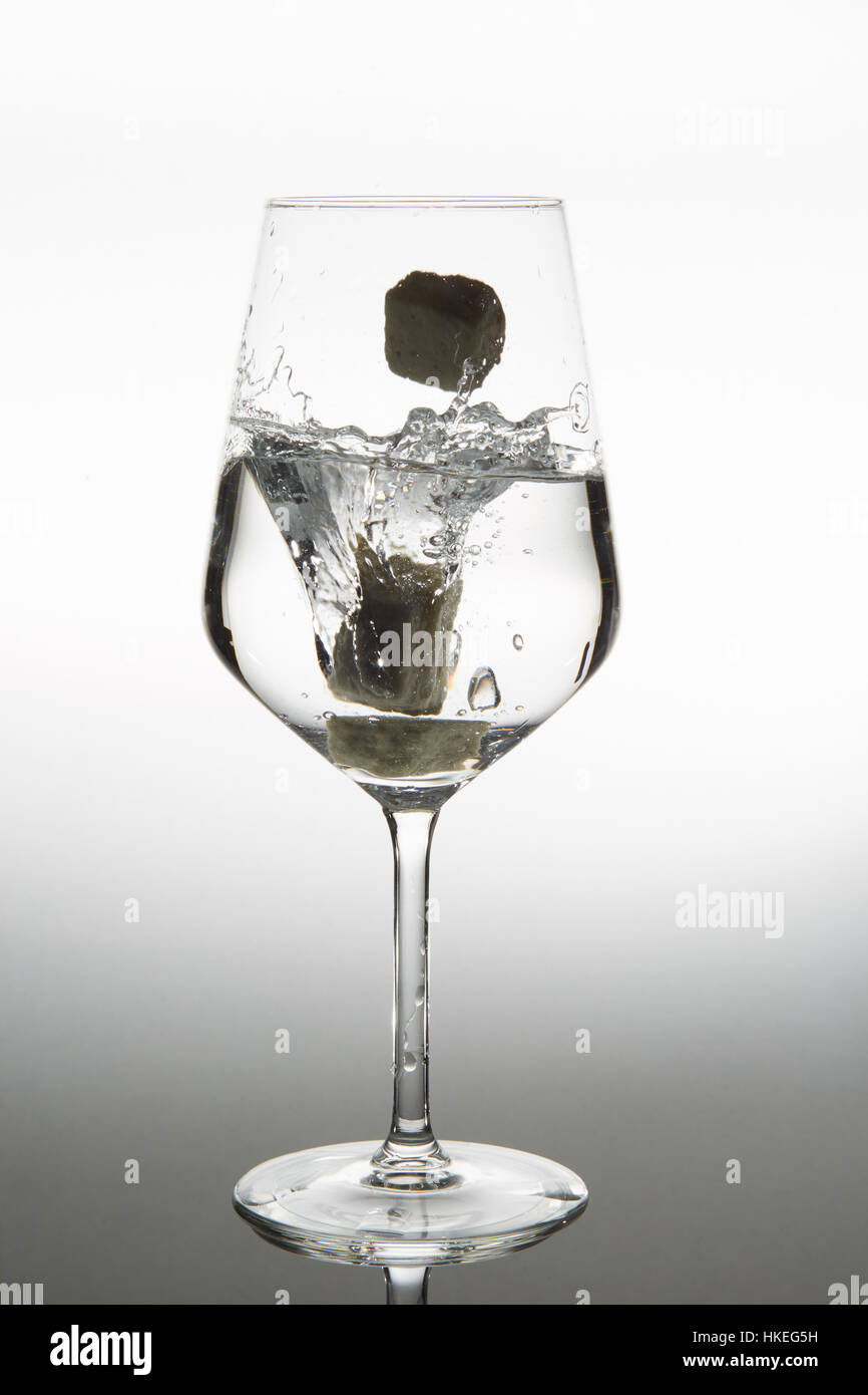 falling water in a glass Stock Photo - Alamy