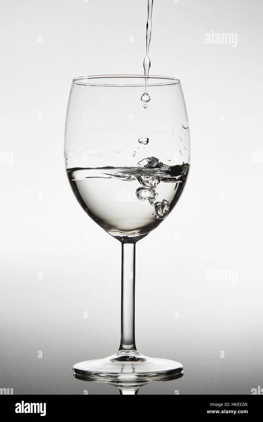 falling water in a glass Stock Photo - Alamy