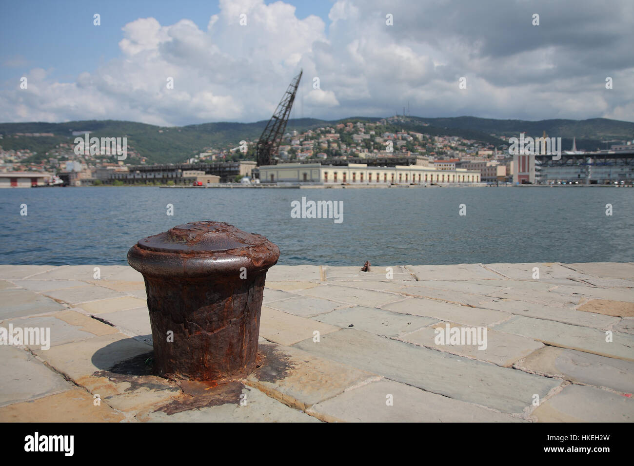 old rusty bollard on pier in Trieste, Italy Stock Photo - Alamy