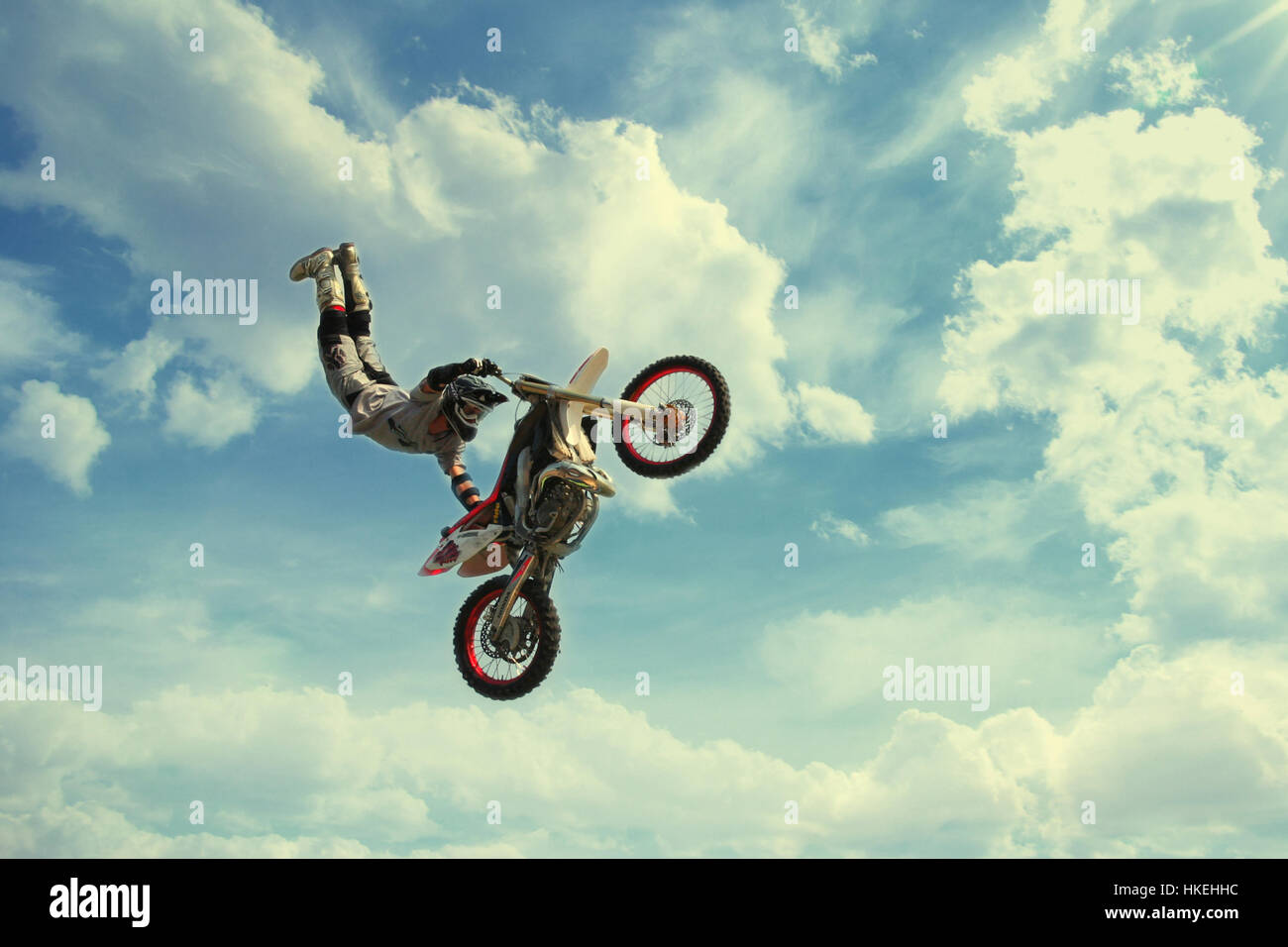 biker acrobatic jump at the trial show Stock Photo - Alamy