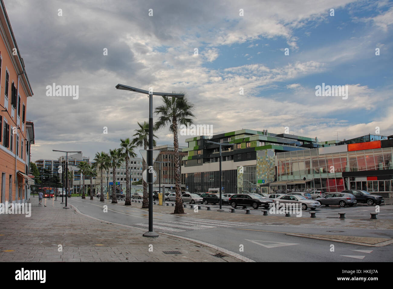 Koper city street with parking and shopping center Stock Photo - Alamy